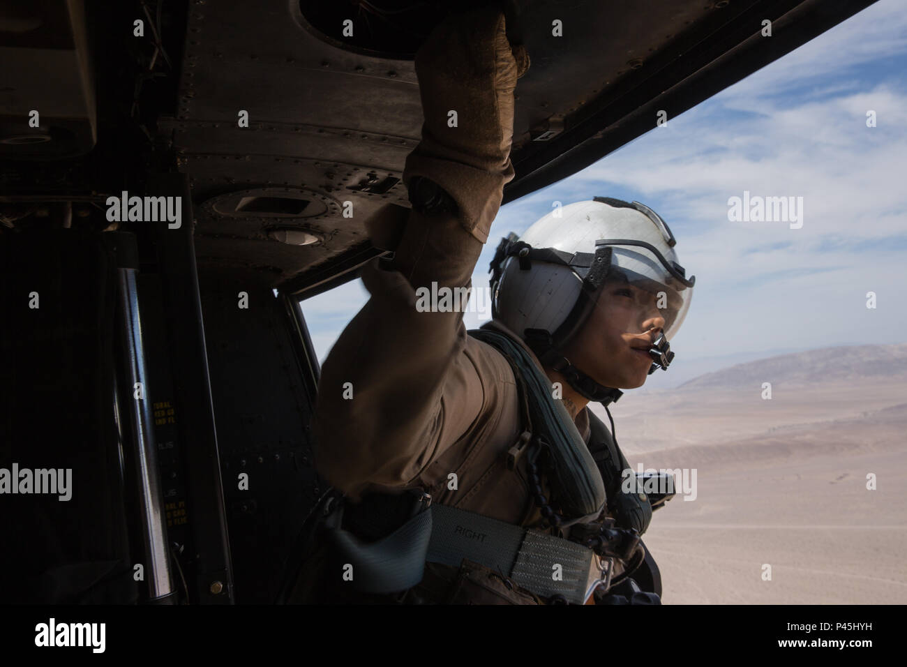Lance Cpl. Servando Avila, a crew chief with Marine Light Attack ...