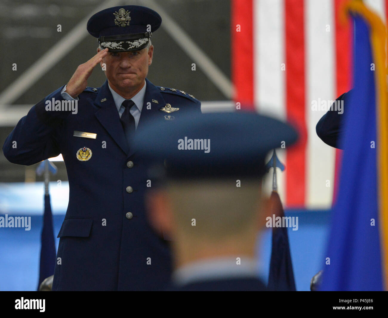 Lt. Gen. Samuel D. Cox, 18th Air Force commander, salutes during the ...