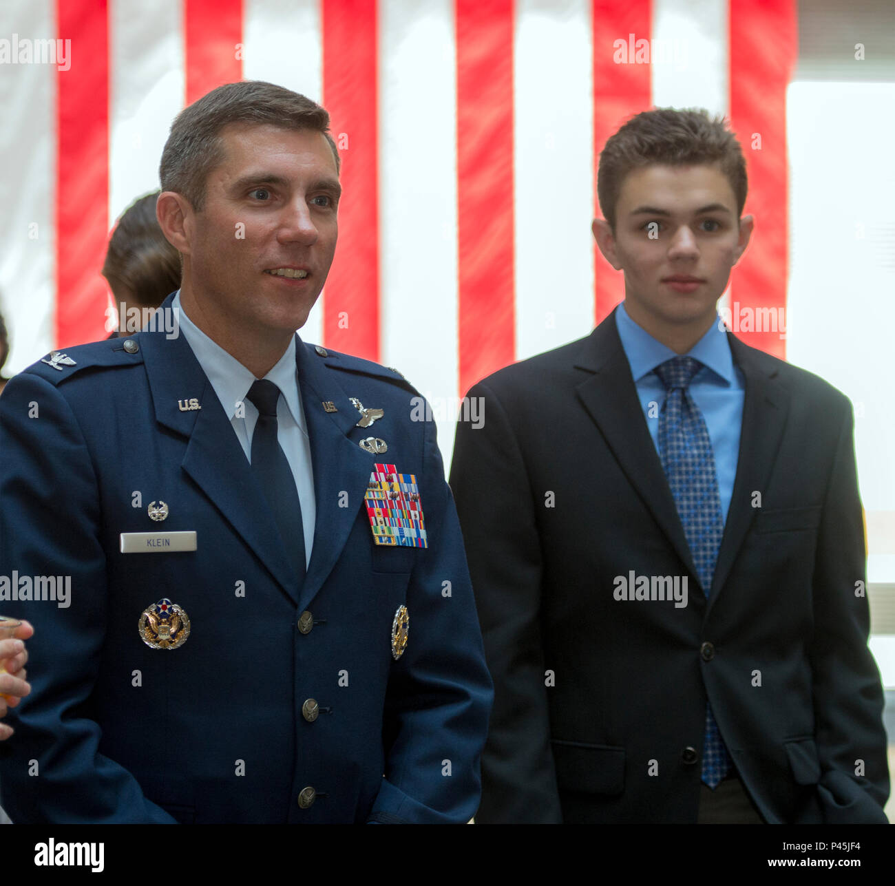 U. S. Air Force Colonel John M. Klein Jr., and his son Sam Klein attend ...
