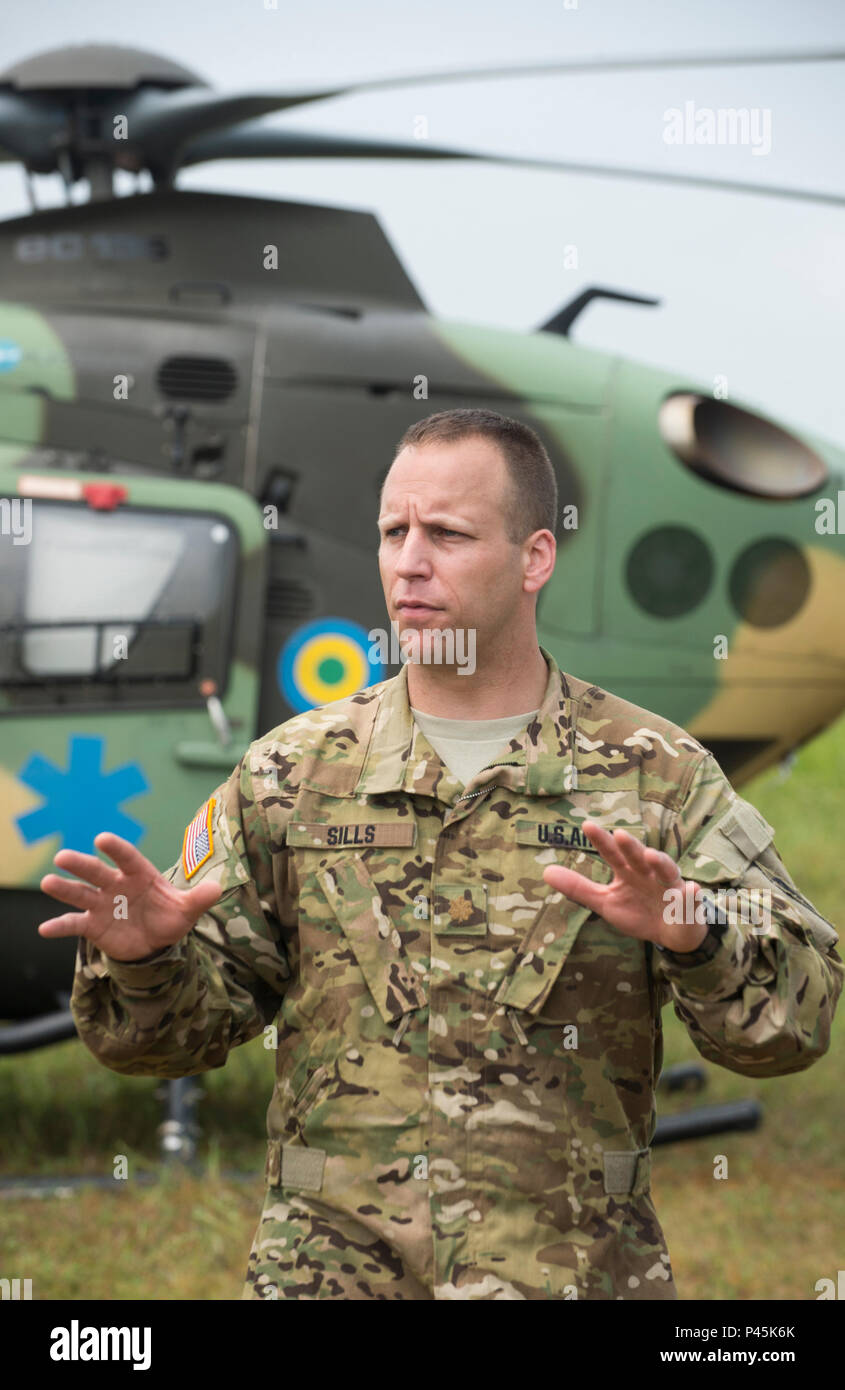 U.S. Army MAJ. Jeffrey Sills, an aeromedical evacuation officer ...