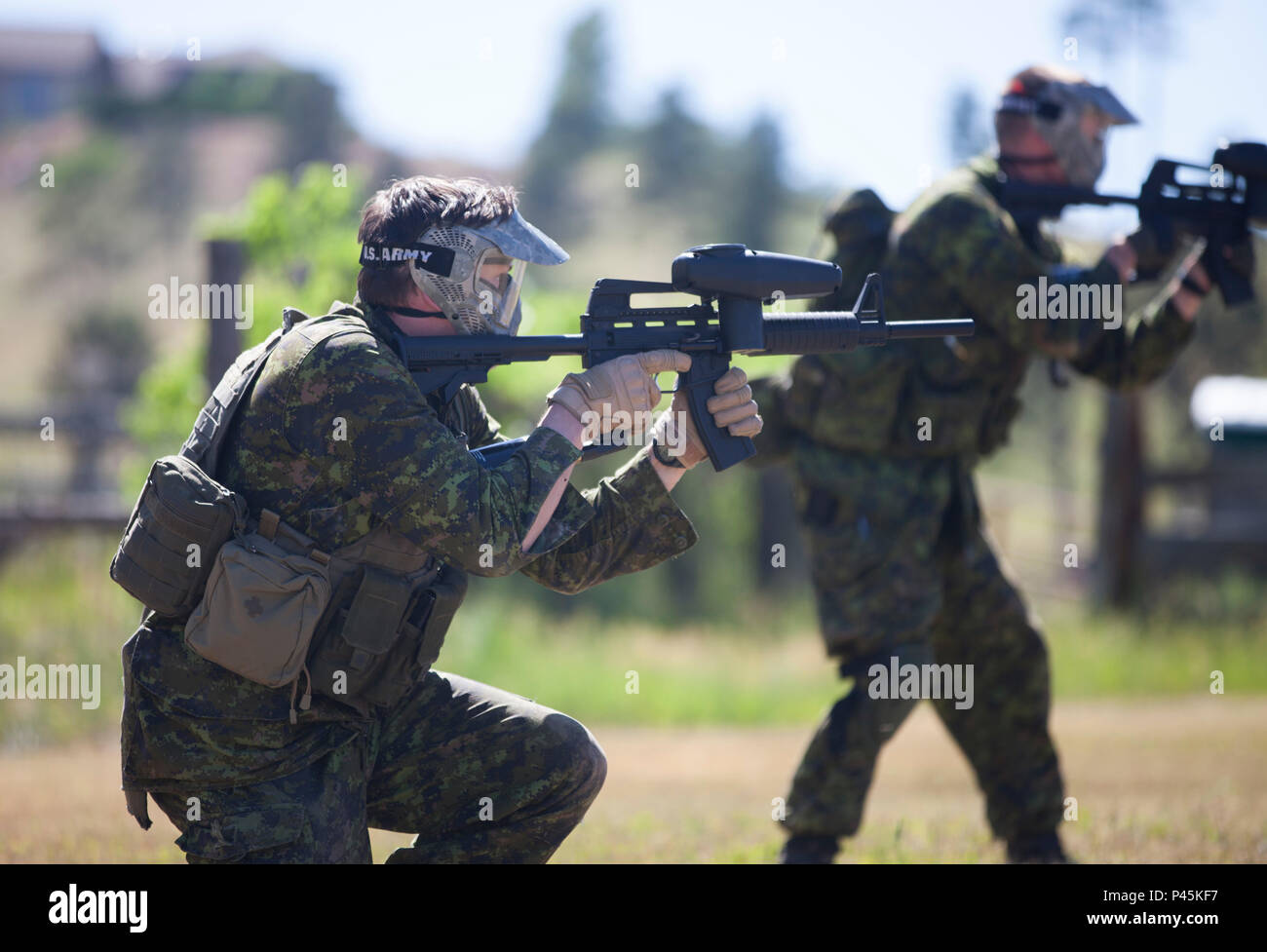 Soldiers of the 41st Canadian Brigade Group, Canadian Army, return fire ...