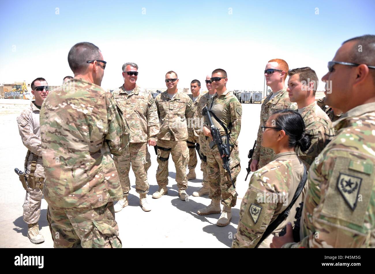 Air Force Maj. Gen. Scott A. Kindsvater (seen left with back toward ...