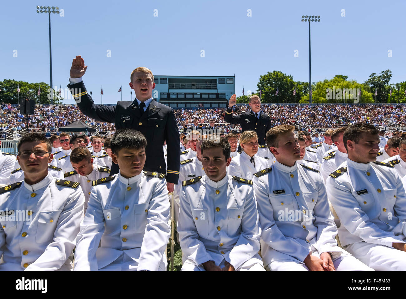 U.S. Army lieutenants take the Oath of the Commissioned Officer for the ...
