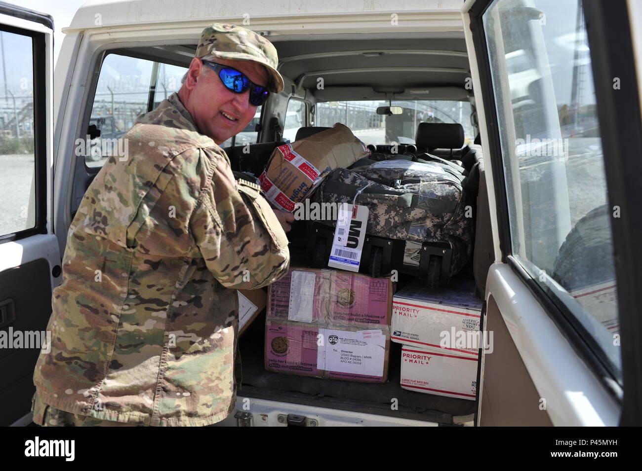 BAGRAM AIRFIELD, AFGHANISTAN (June 22, 2016) - Eric Longenbach picks up ...