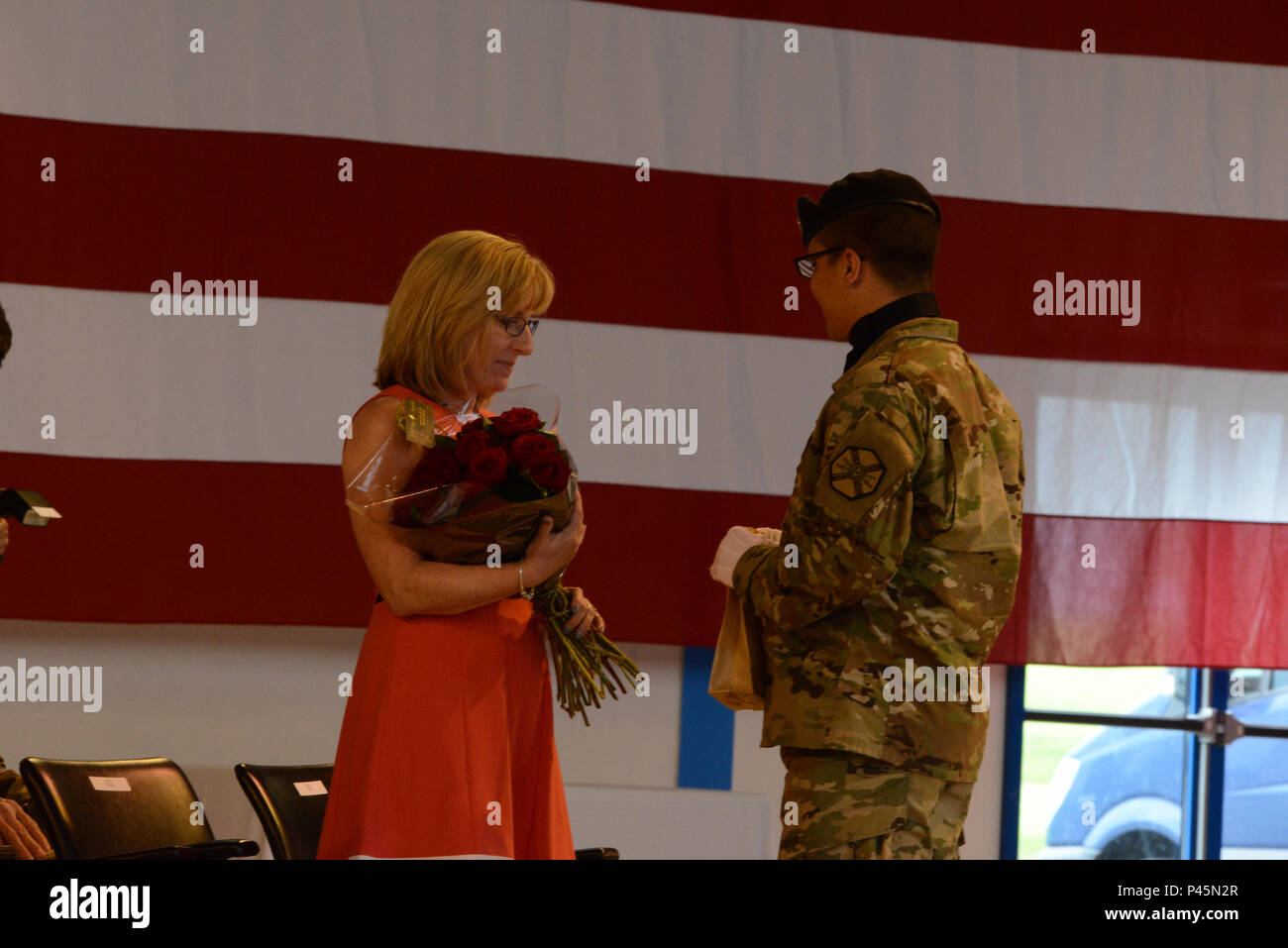 MS. Julie C. Vannatter, Col. Marty G. Vannatter's wife, receives a ...