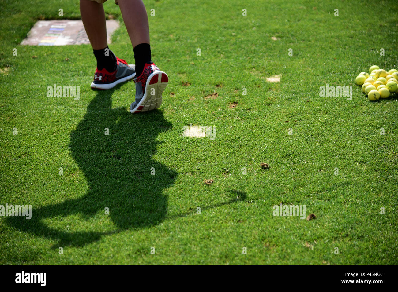 PETERSON AIR FORCE BASE Colo. - A young golfer swings away on the ...