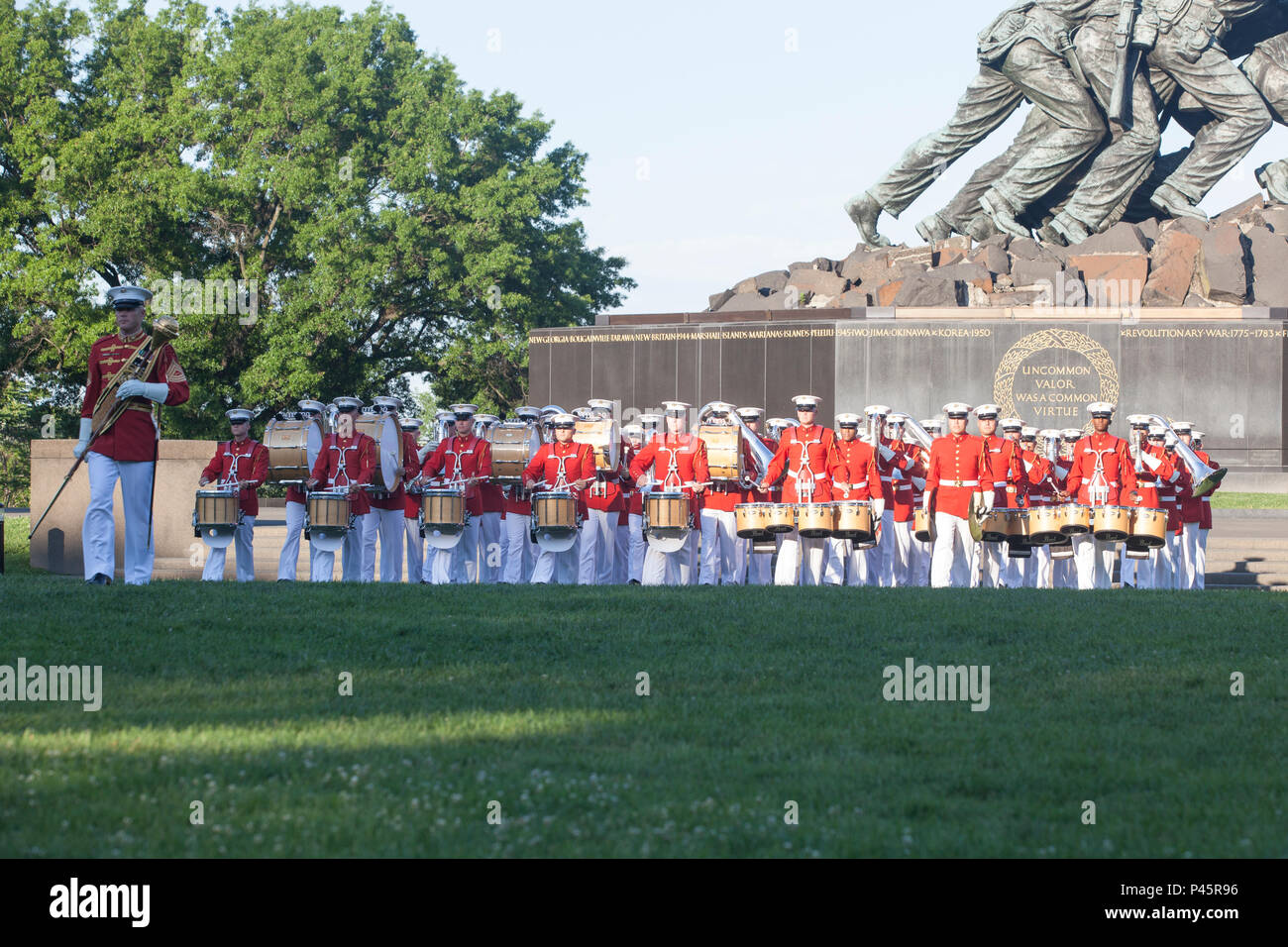 U.S. Marines with the Marine Corps Drum and Bugle Corps perform during ...