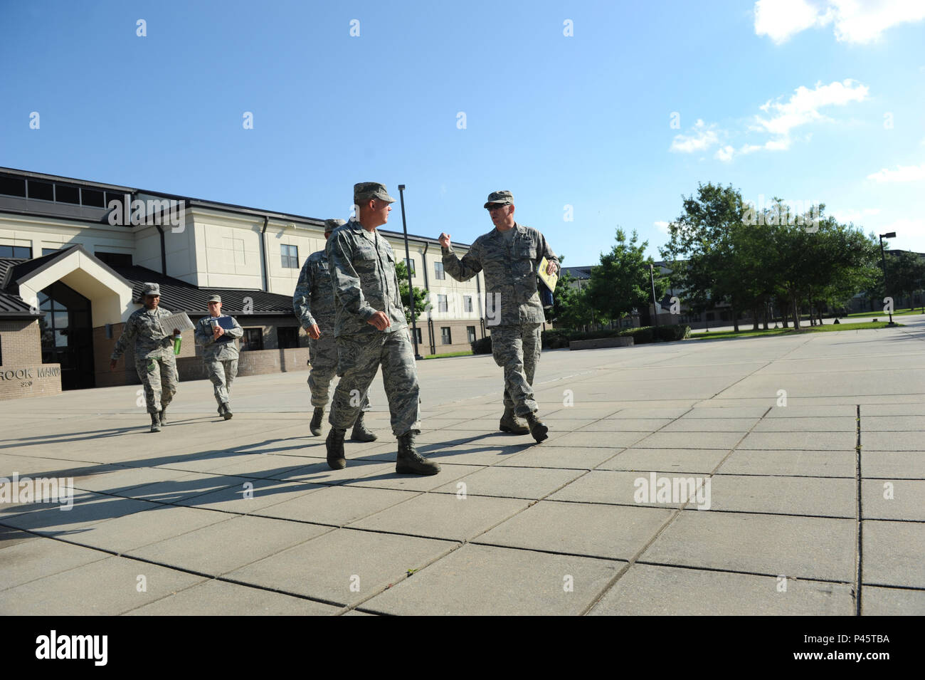Col. C. Mike Smith, 81st Training Wing vice commander, talks with Col ...