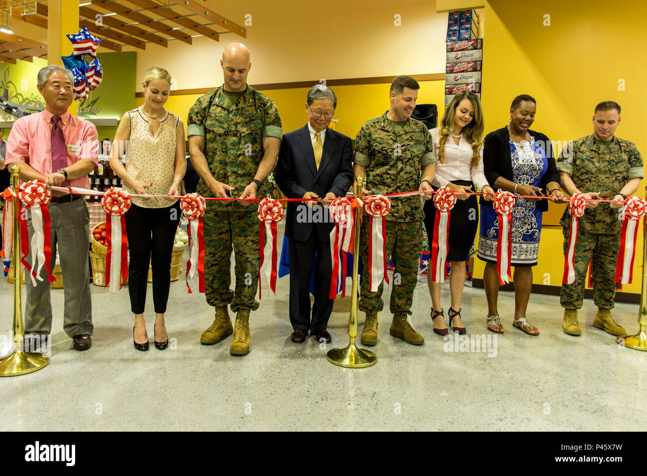 From left to right, Buddie Kolath, store director, Kim Shipley, a ...
