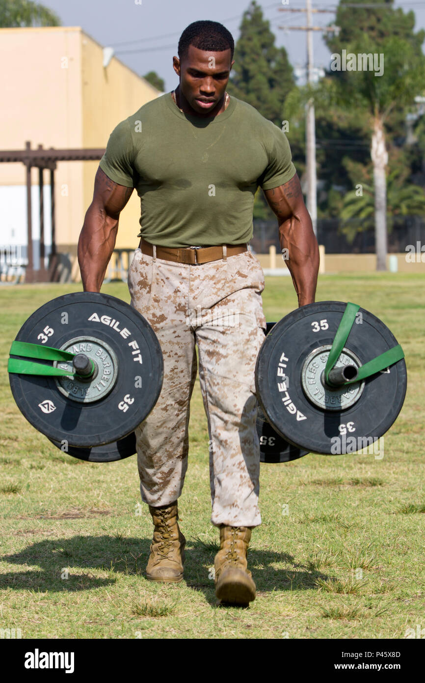 U.S. Marine Corps Sgt. Marvel J. Thompson with the Distribution ...