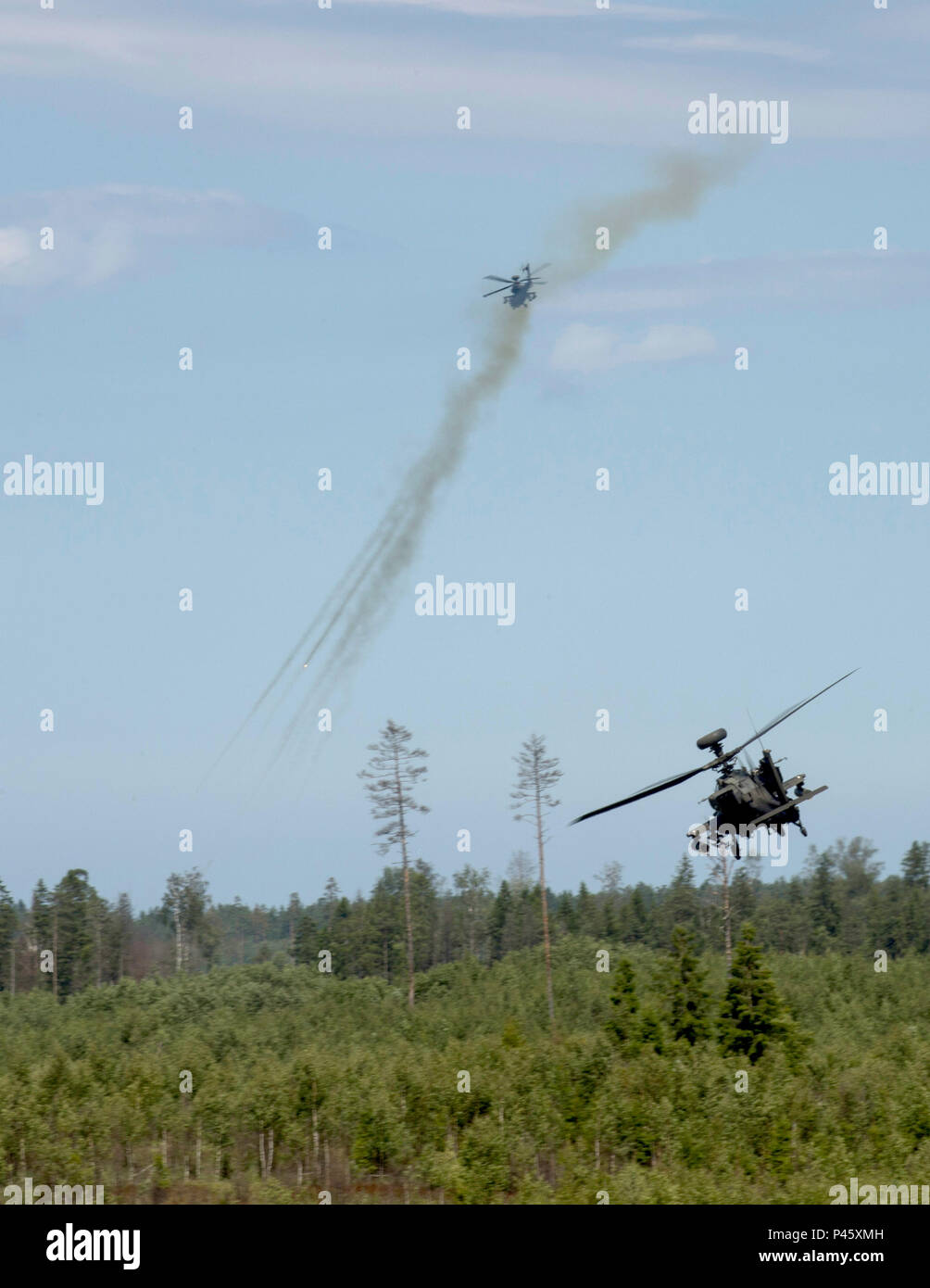 The pilot of an AH-64 Apache helicopter from the 12th Combat Aviation ...