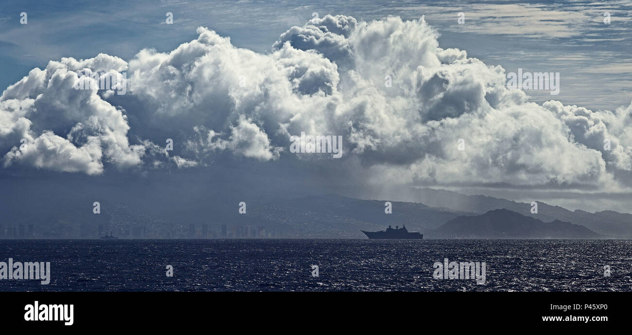 The Australian Navy Landing Helicopter Dock (LHD) HMAS Canberra makes ...