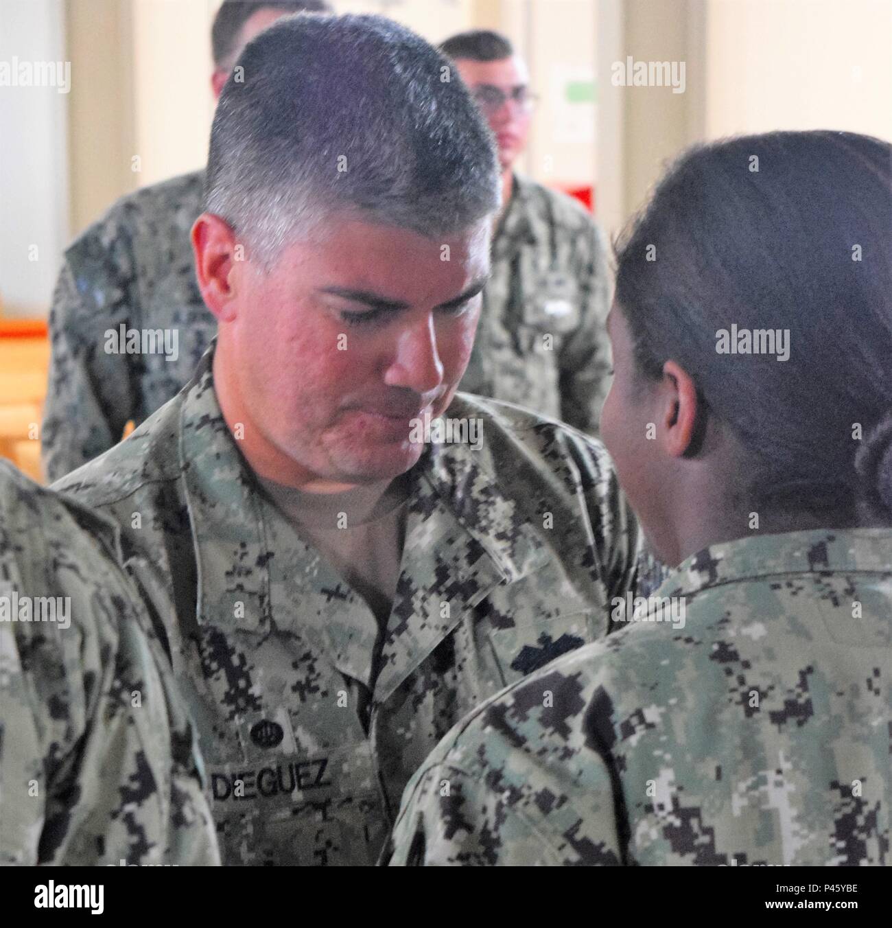 Utilitiesman Second Class Ashley Franklin receives a promotion from E4 ...