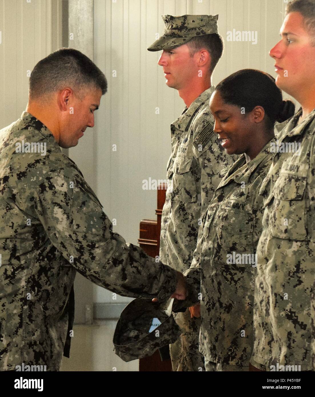 Utilitiesman Second Class Ashley Franklin receives a promotion from E4 ...