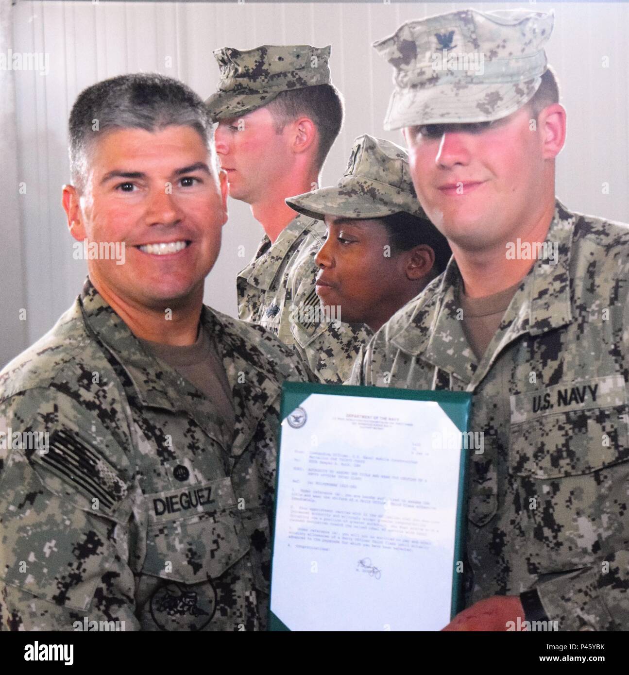 Equipment Operator Third Class Sawyer Buck receives a promotion from E3 ...