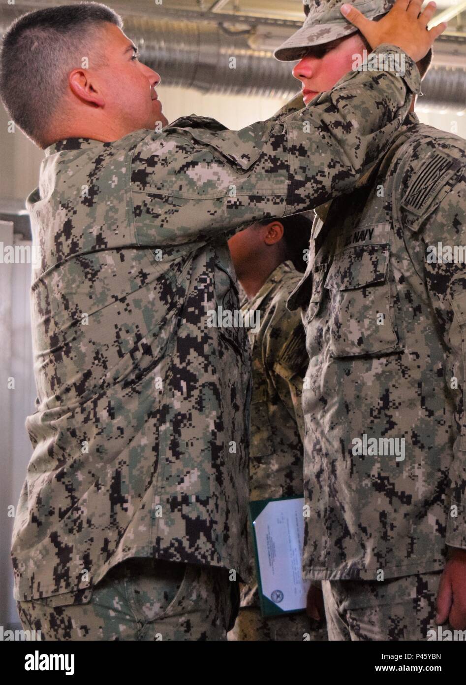 Equipment Operator Third Class Sawyer Buck receives a promotion from E3 ...