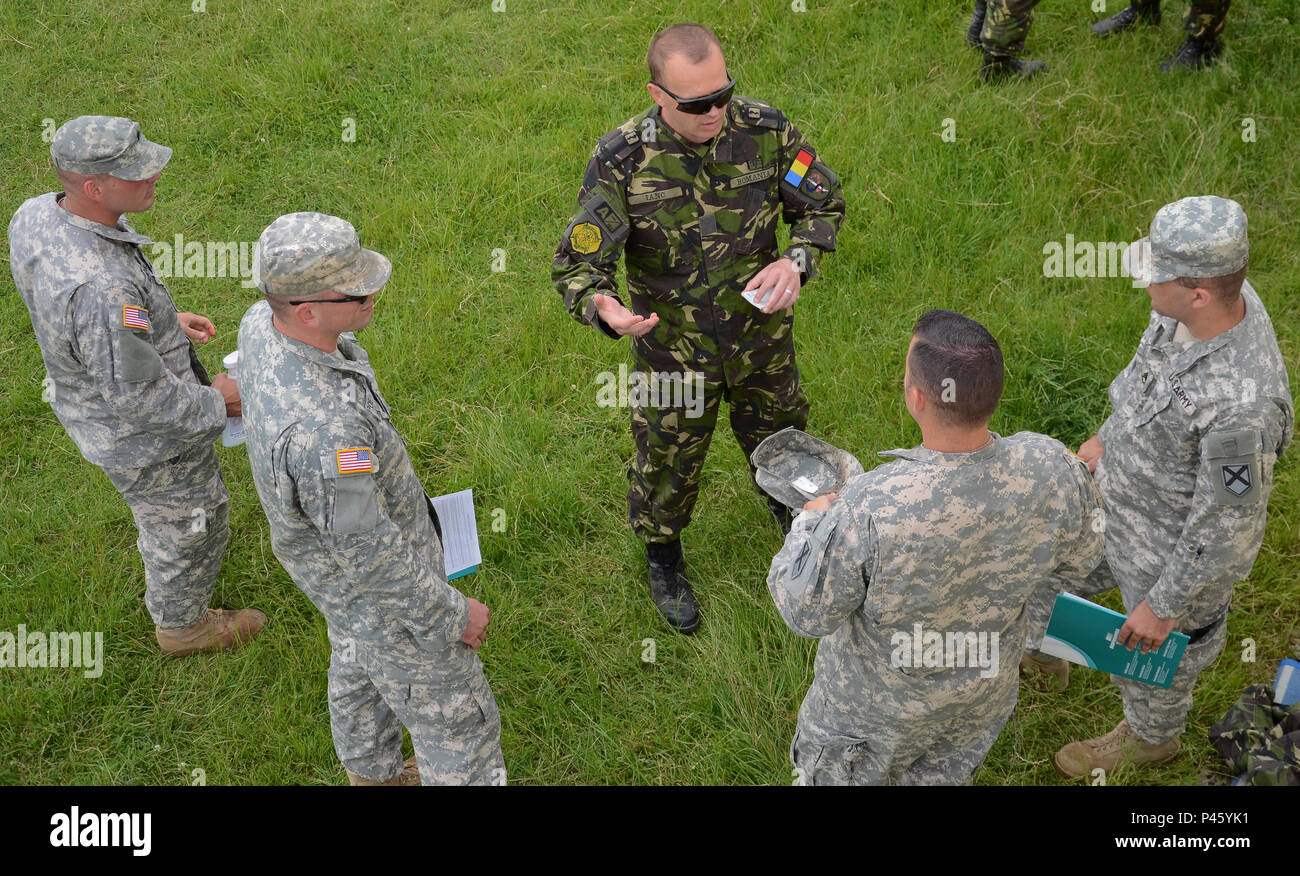 Ltc. Daniel Ianc, Director of Medical Training, discusses with the ...