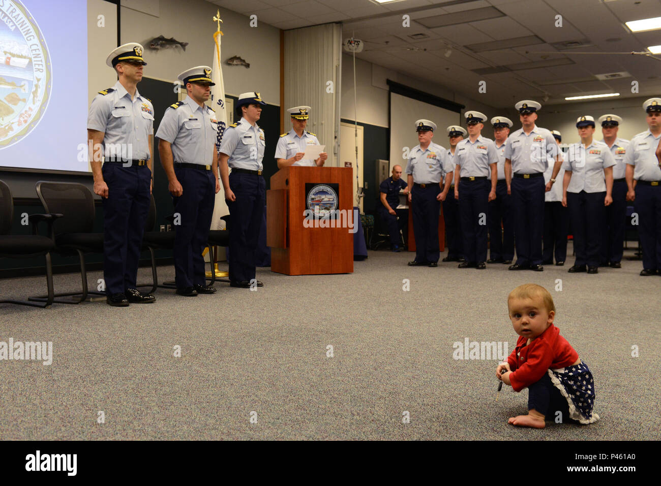 Nine-month-old Lilah Hulse attends her father, Lt. Steven Hulse’s ...
