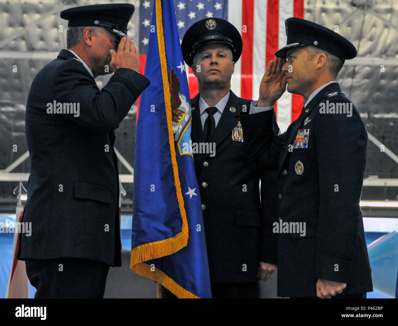 Lt. Gen. Samuel D. Cox, 18th Air Force commander, returns a salute to ...