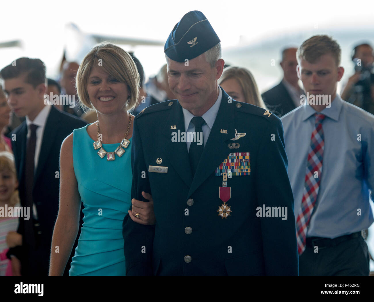 U.S. Air Force Colonel Joel D. Jackson escorts his wife, Mrs. Lanette ...