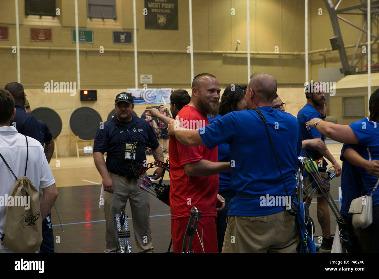 U.S. Marine Corps veteran Clayton McDaniel is congratulated on his ...