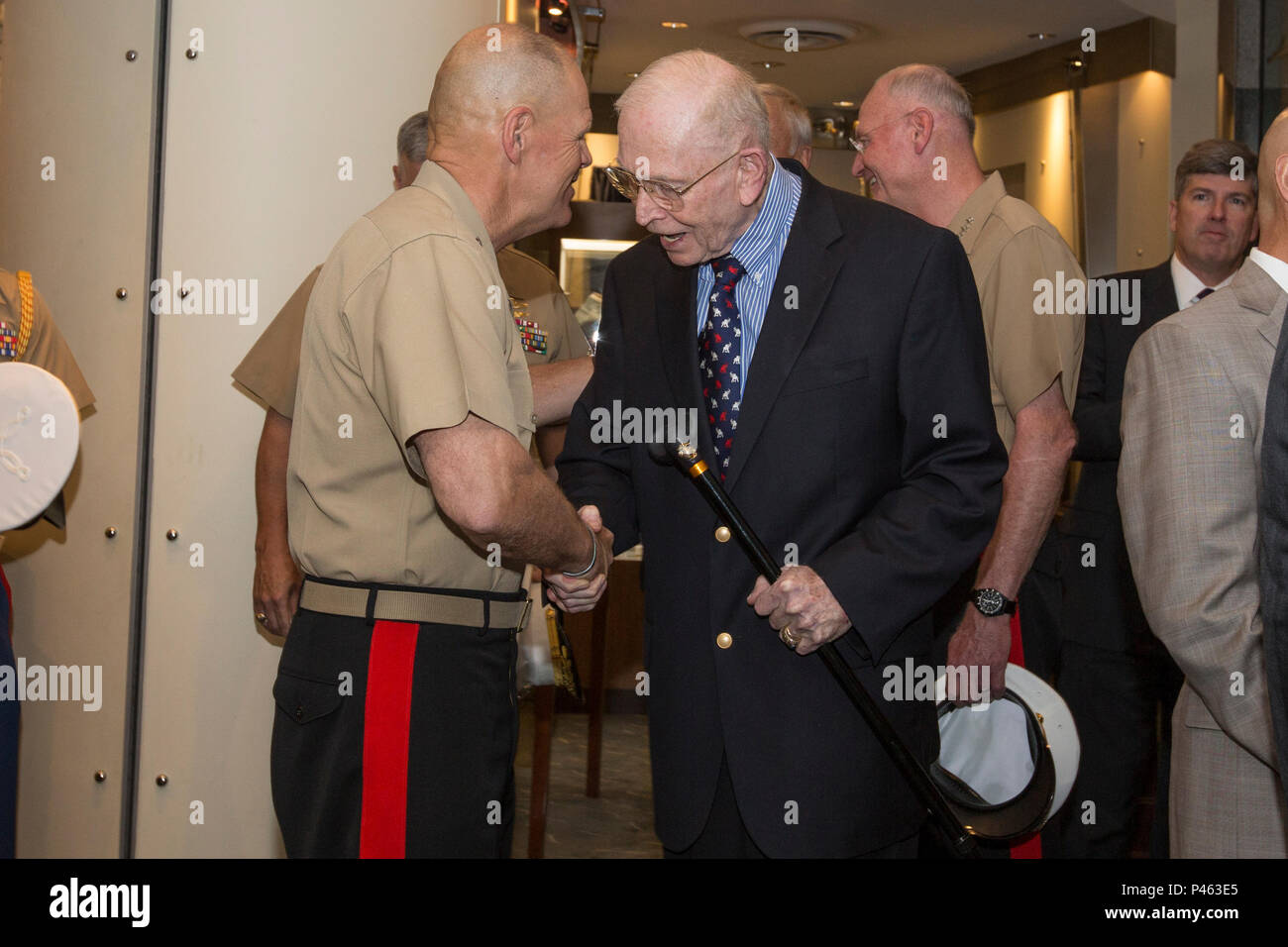 Commandant of the Marine Corps Gen. Robert B. Neller, left, shakes ...