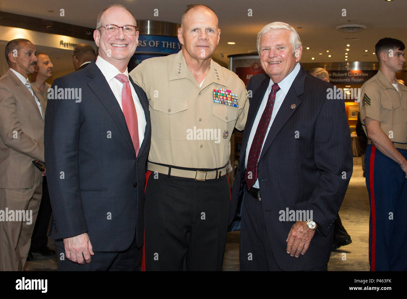 Commandant of the Marine Corps Gen. Robert B. Neller, center, poses for ...