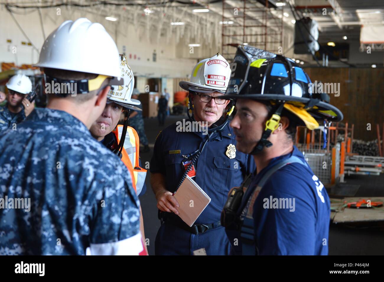 SAN DIEGO (June 29, 2016) Lt. Federal firefighters talk to an officer ...