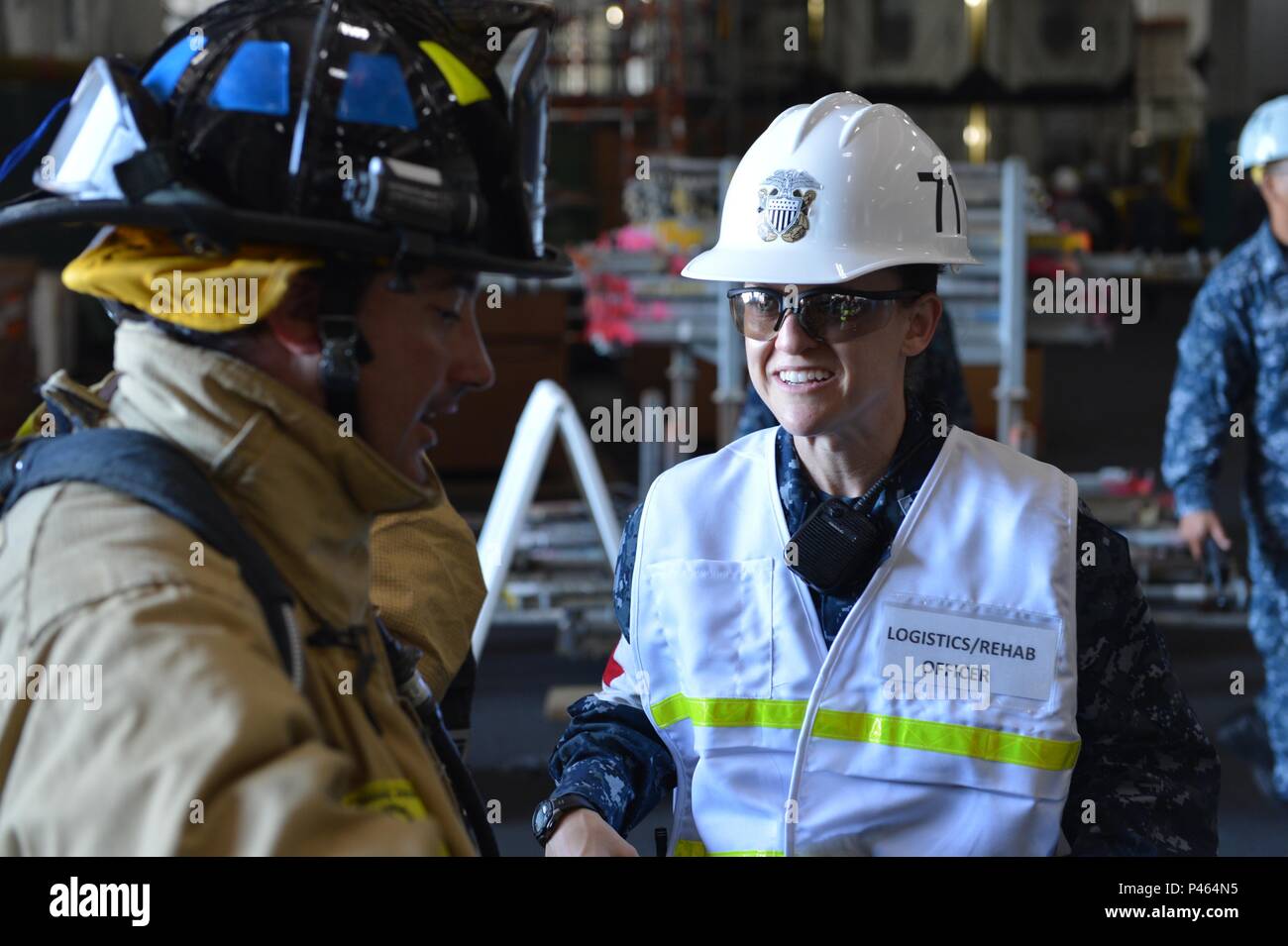 SAN DIEGO (June 29, 2016) Lt. Devon Czarzasty talks with a Federal ...