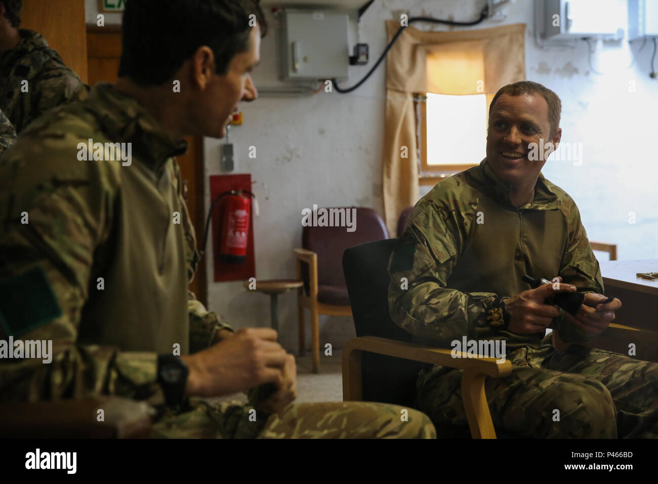 British Army Lt. Col. Wil Hunt, left, and Warrant Officer Class 1 How ...