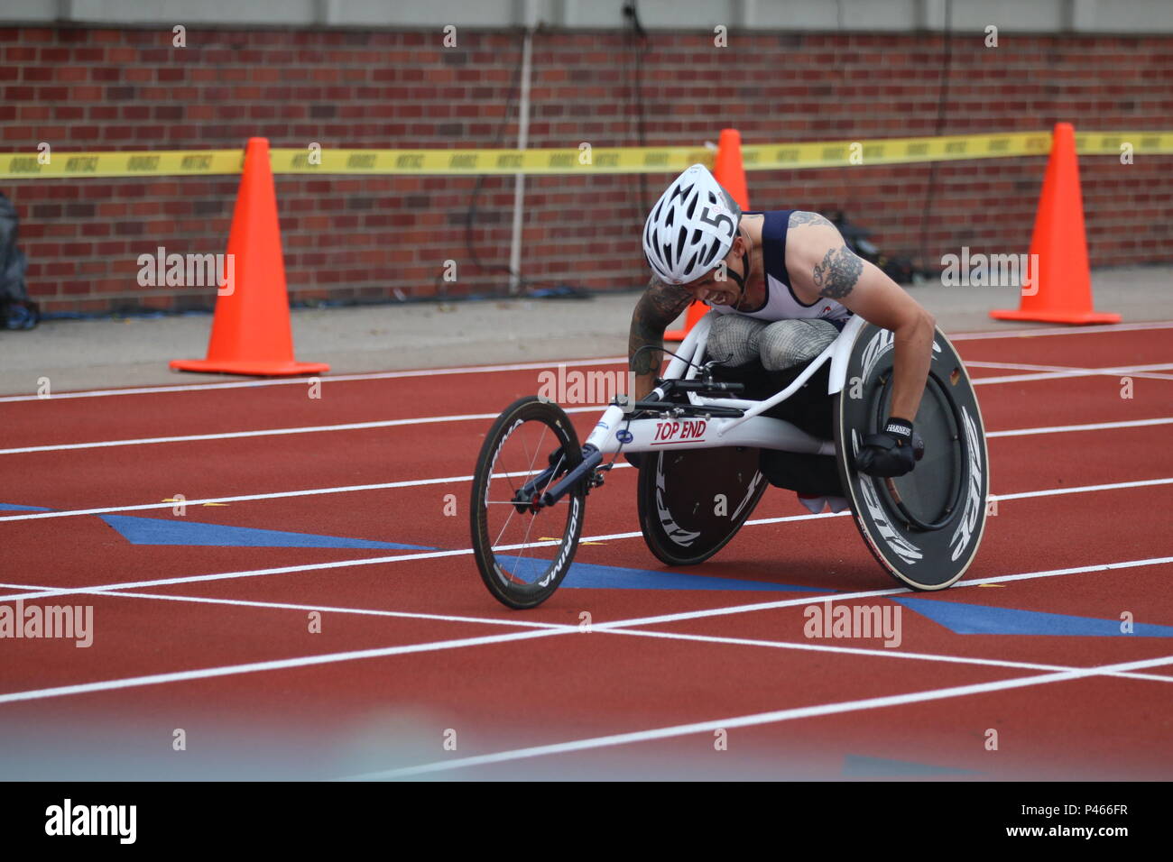 Navy athlete cycles during the track and field competition for the 2016 ...