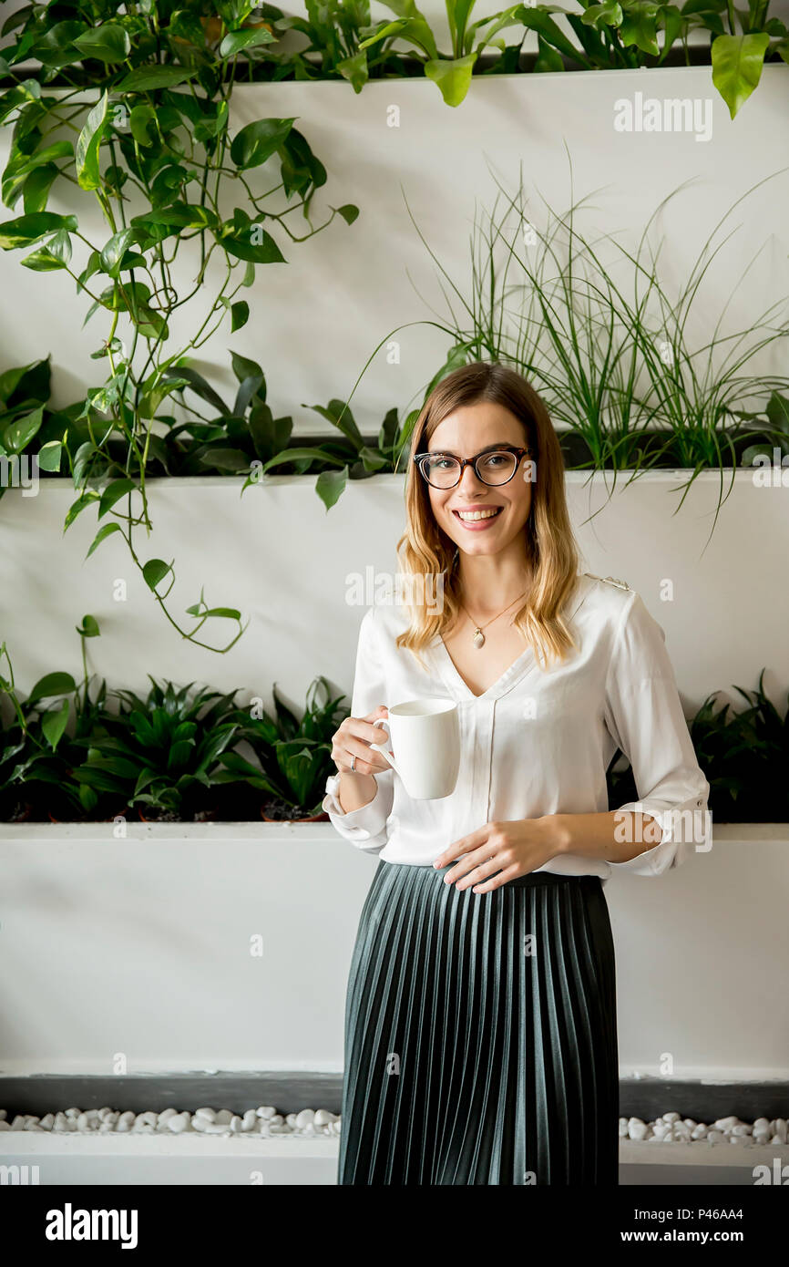Beautiful female portrait in office hi-res stock photography and images ...