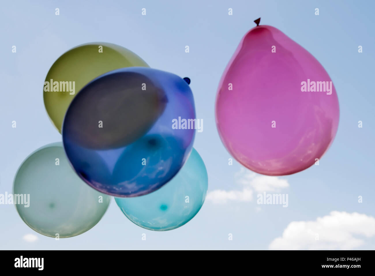 Colorful balloons fly in the sky hi-res stock photography and images ...