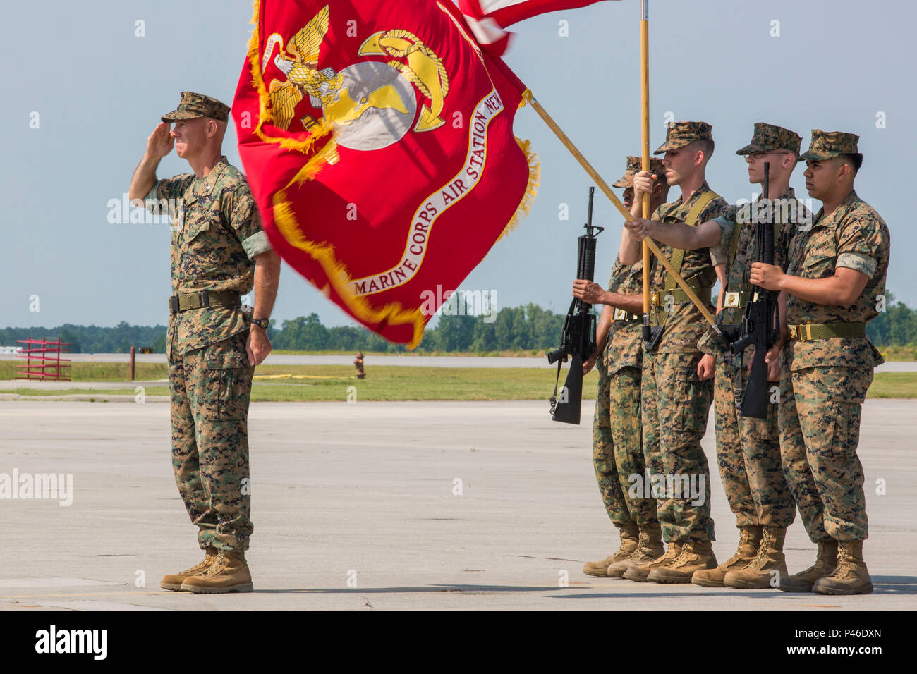U.S. Marine Corps Col. Timothy M. Salmon (left), renders honors during ...