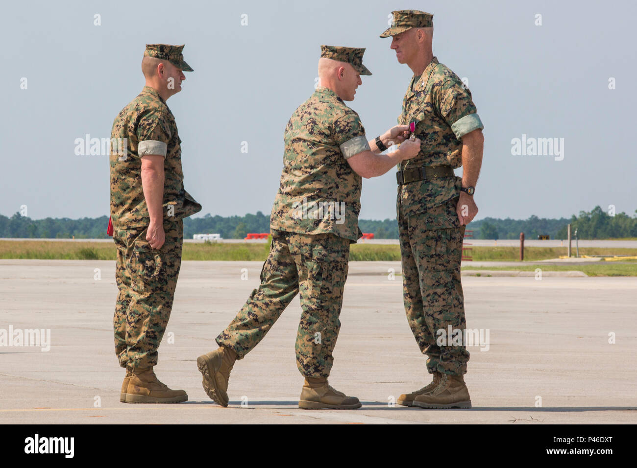 U.S. Marine Corps Brig. Gen. Thomas D. Weidley (center), commanding ...