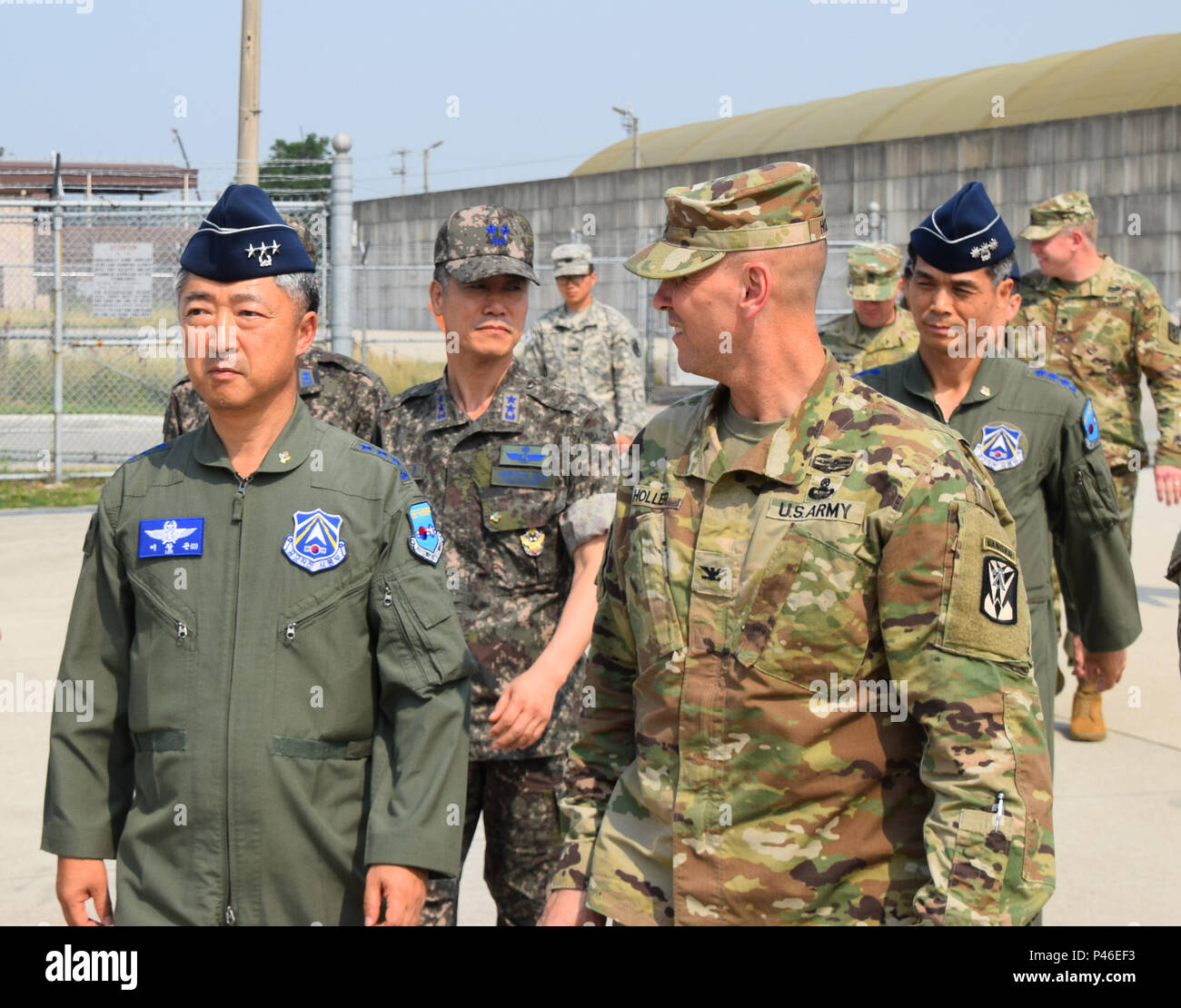 Col. Mark Holler, 35th Air Defense Artillery Brigade commander, right ...