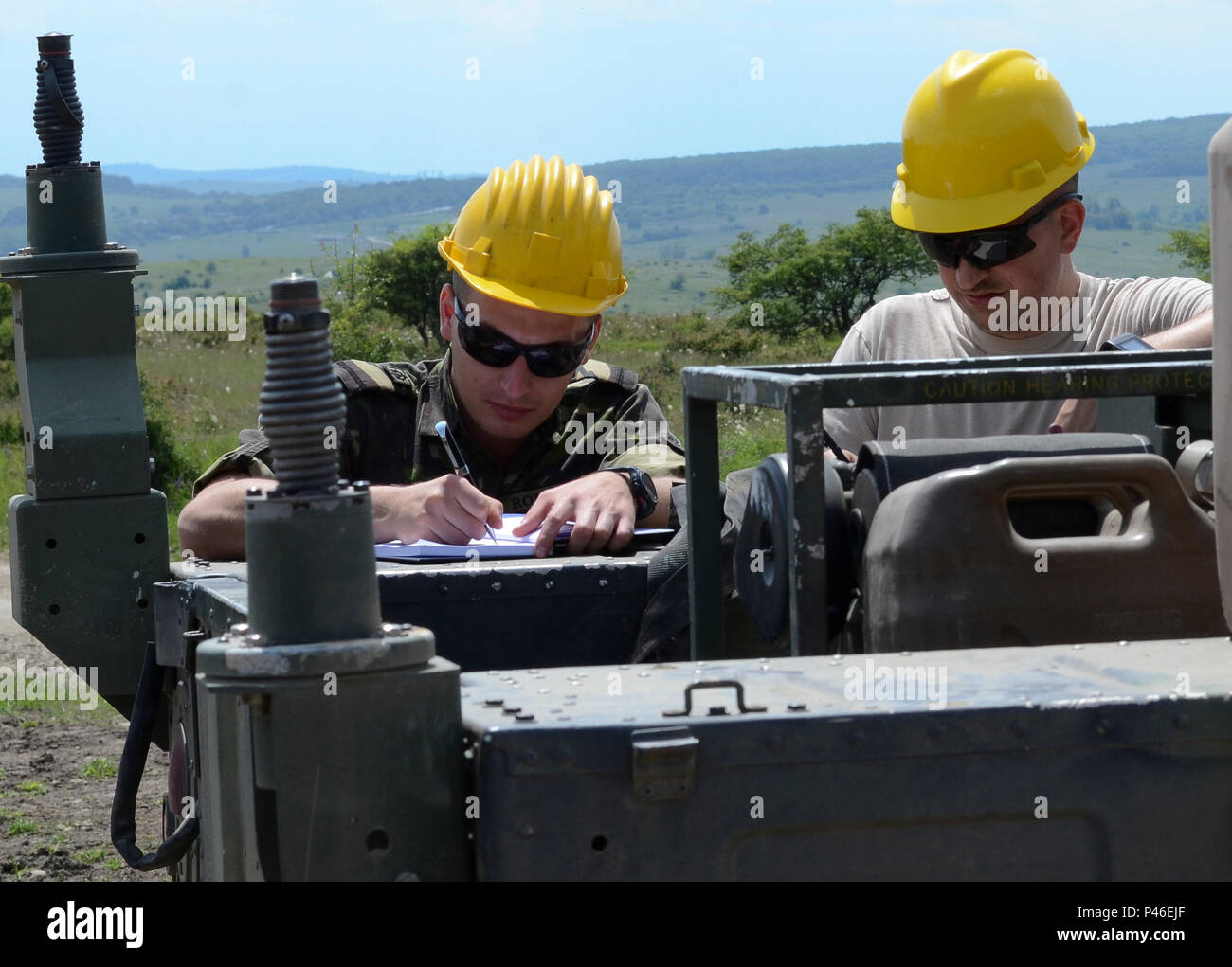 Second Lt. Dan Aron (left), 1652 Engineer Battalion, Romanian Land ...