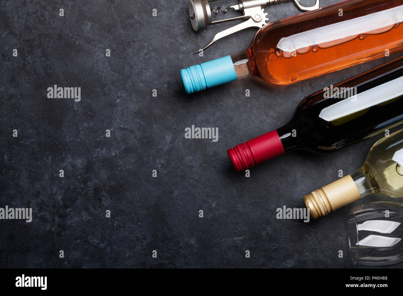 Red, rose and white wine bottles. Top view with space for your text ...