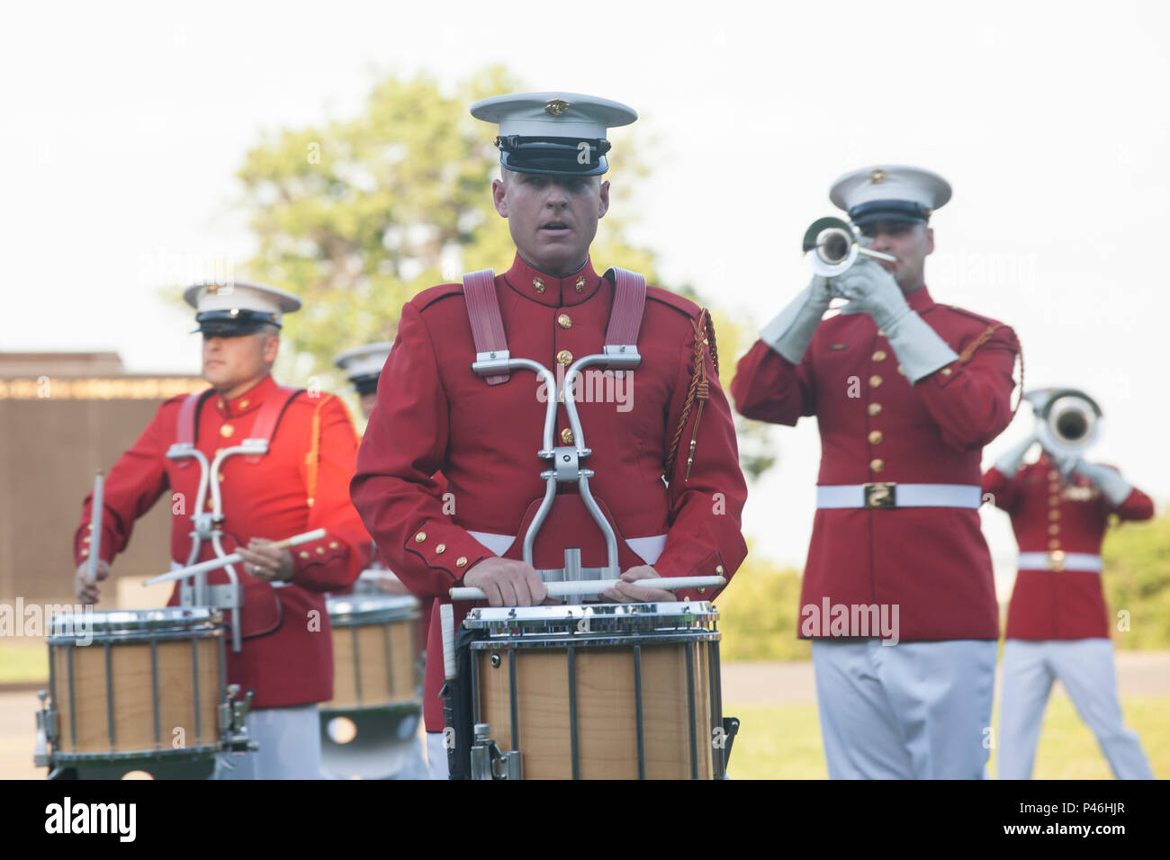 U.S. Marines with the Marine Corps Drum and Bugle Corps perform during ...