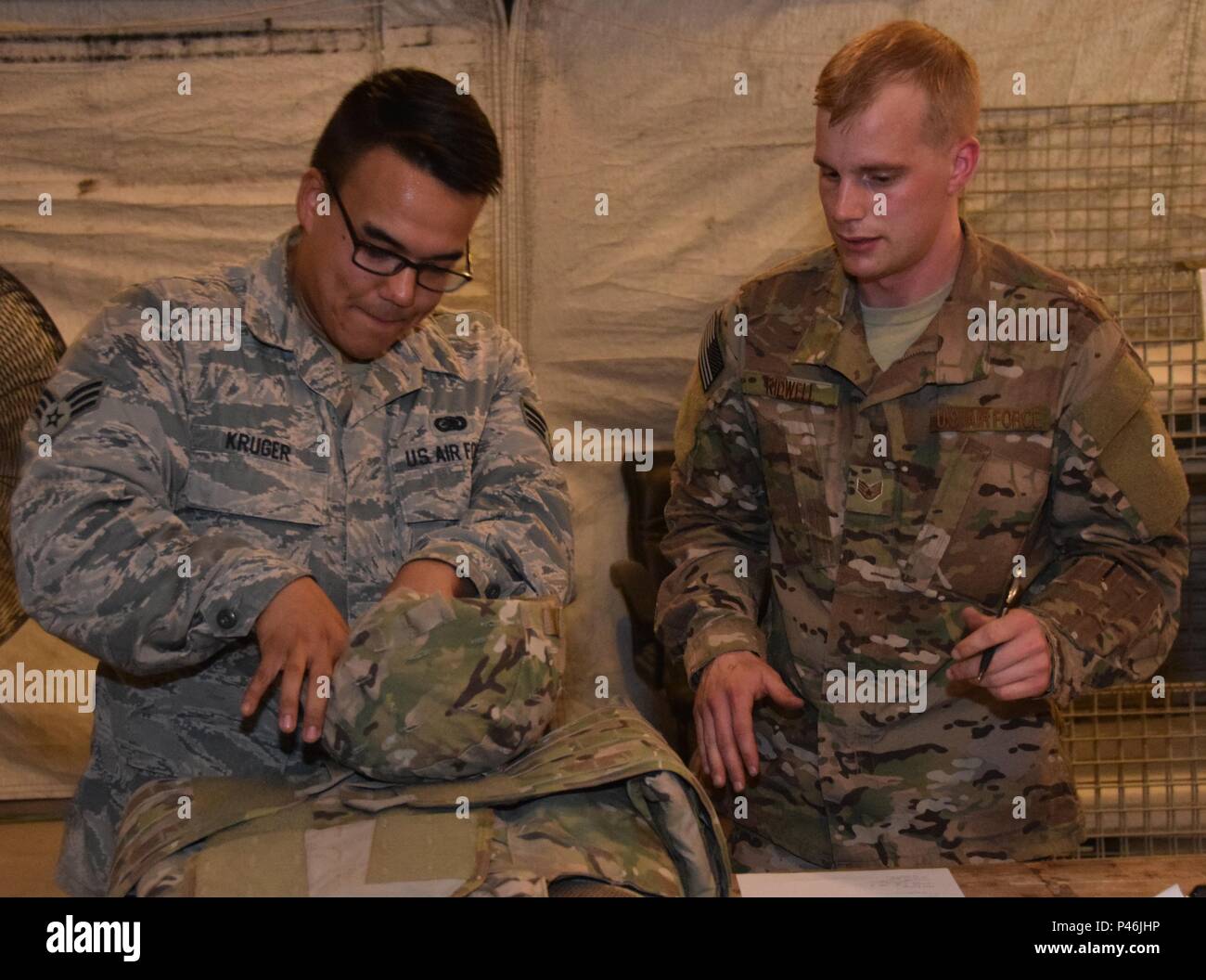 Senior Airman Todd Kruger (left), a 379th Logistics Readiness Squadron ...