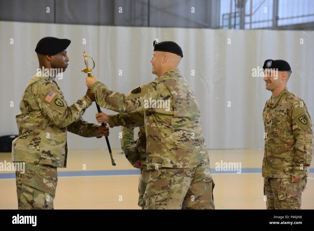 U.S. Army incoming Command Sgt. Maj. Alan J. Cline, returns the non ...