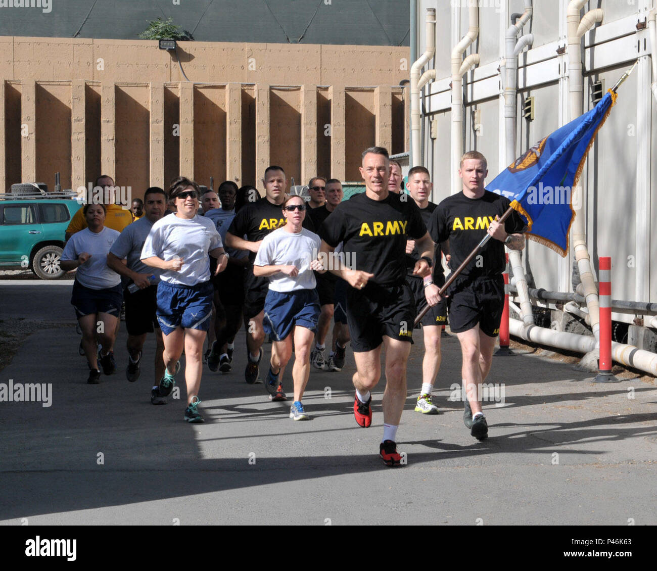 A U.S. Army general leads Soldiers, Sailors, Airmen, Marines, and ...