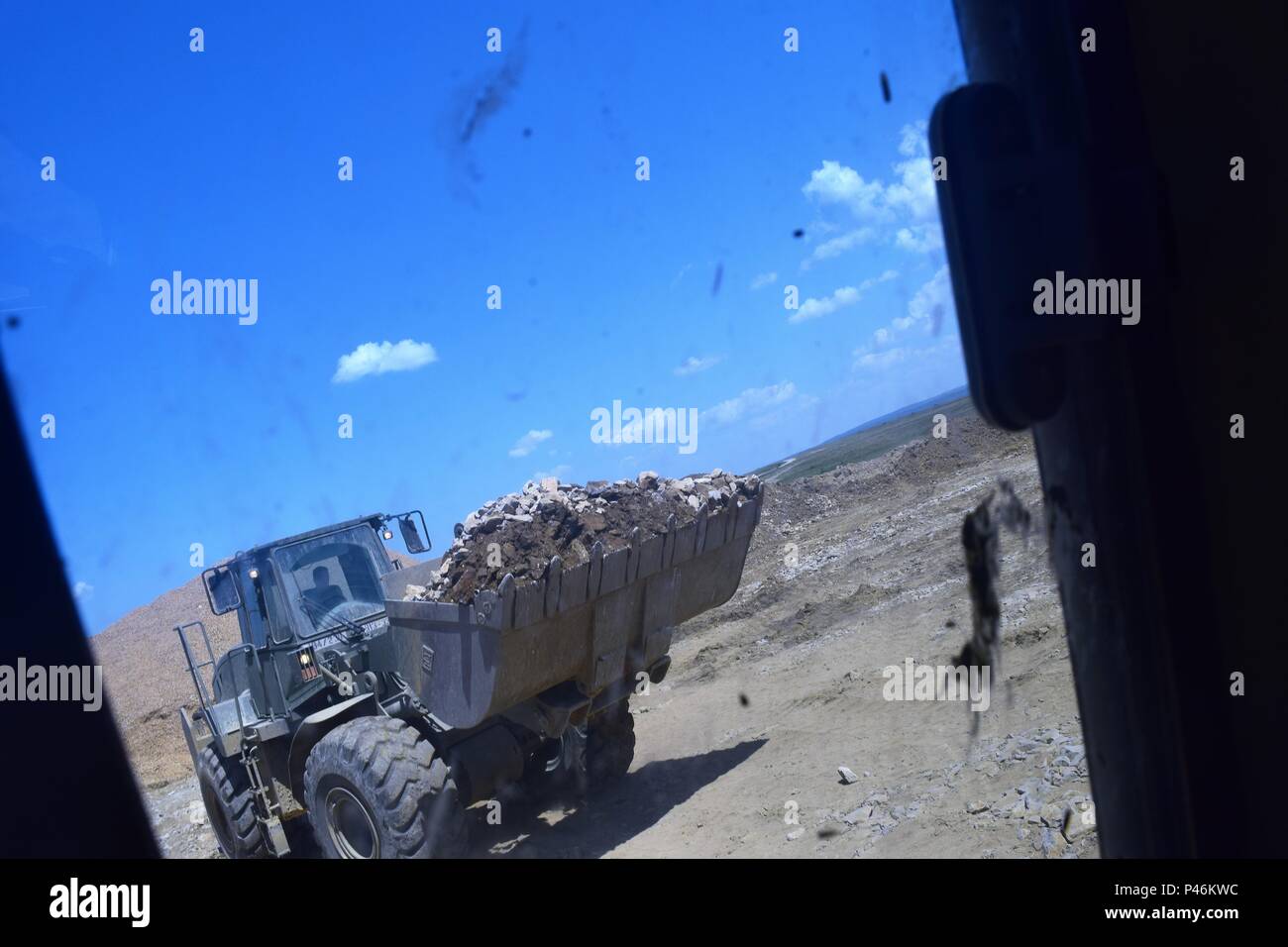 A heavy equipment operator from the 168th Engineer Brigade, Mississippi ...