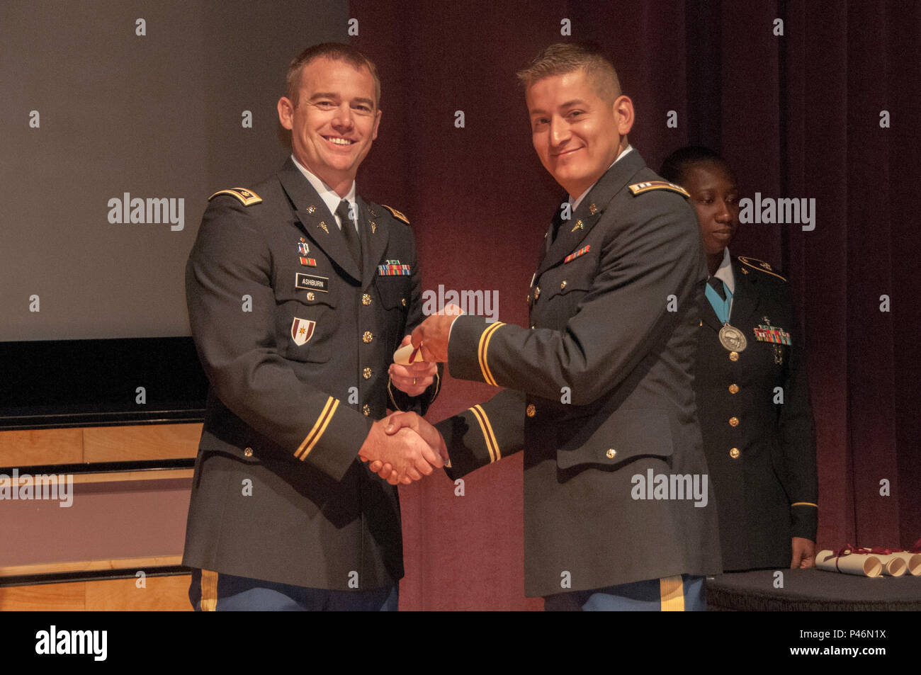 Capt. Alejandro S. Toscano (right), a native of Arlington, Texas and ...