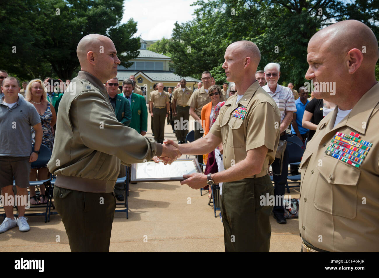 U.S. Marine Corps Master Gunnery Sgt. Marcus R. Dawson, left ...