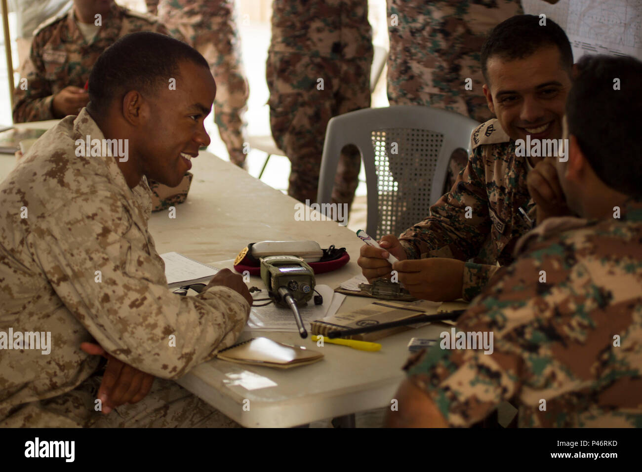 U.S. Marine 1st Lt. Nicholas Davis (left), fire support coordination ...