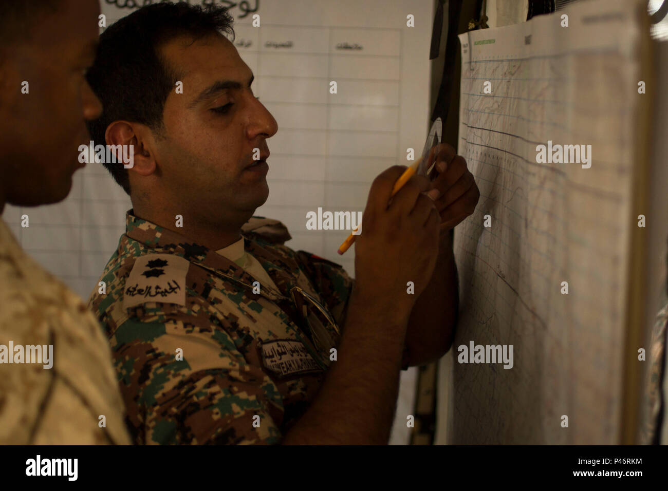 U.S. Marine 1st Lt. Nicholas Davis (left), fire support coordination ...