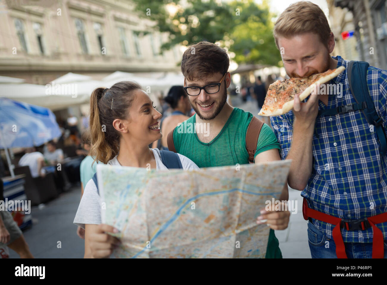 Happy tourists traveling and sightseeing Stock Photo - Alamy