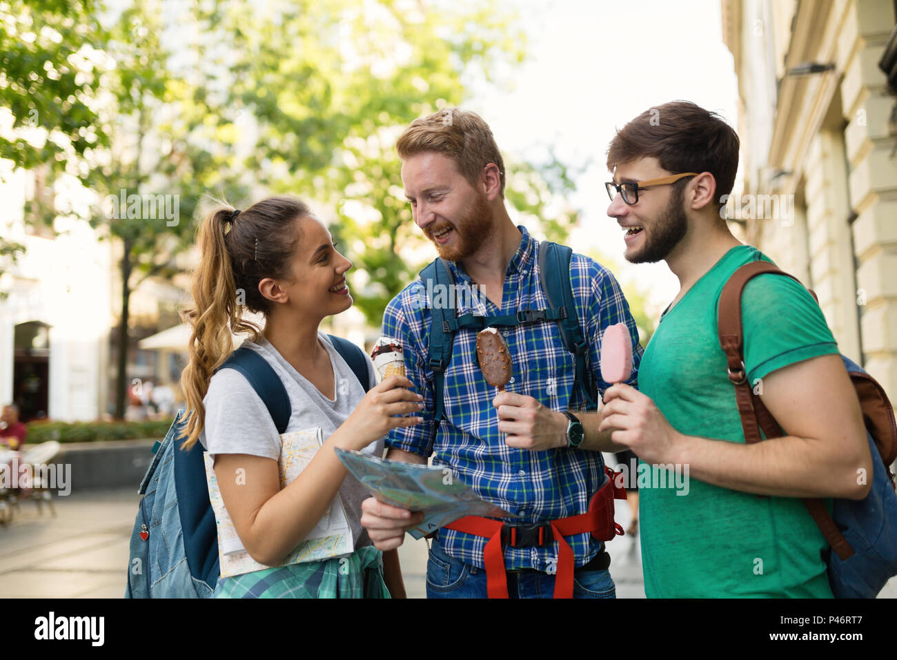Travelling young people sightseeing Stock Photo - Alamy