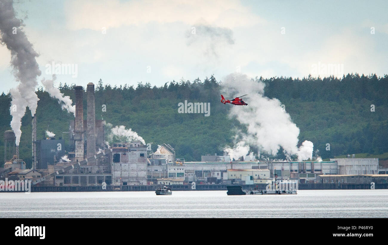 INDIAN ISLAND, Wash. (June 9, 2016) - U.S. Coastguardsmen in MH-65 ...